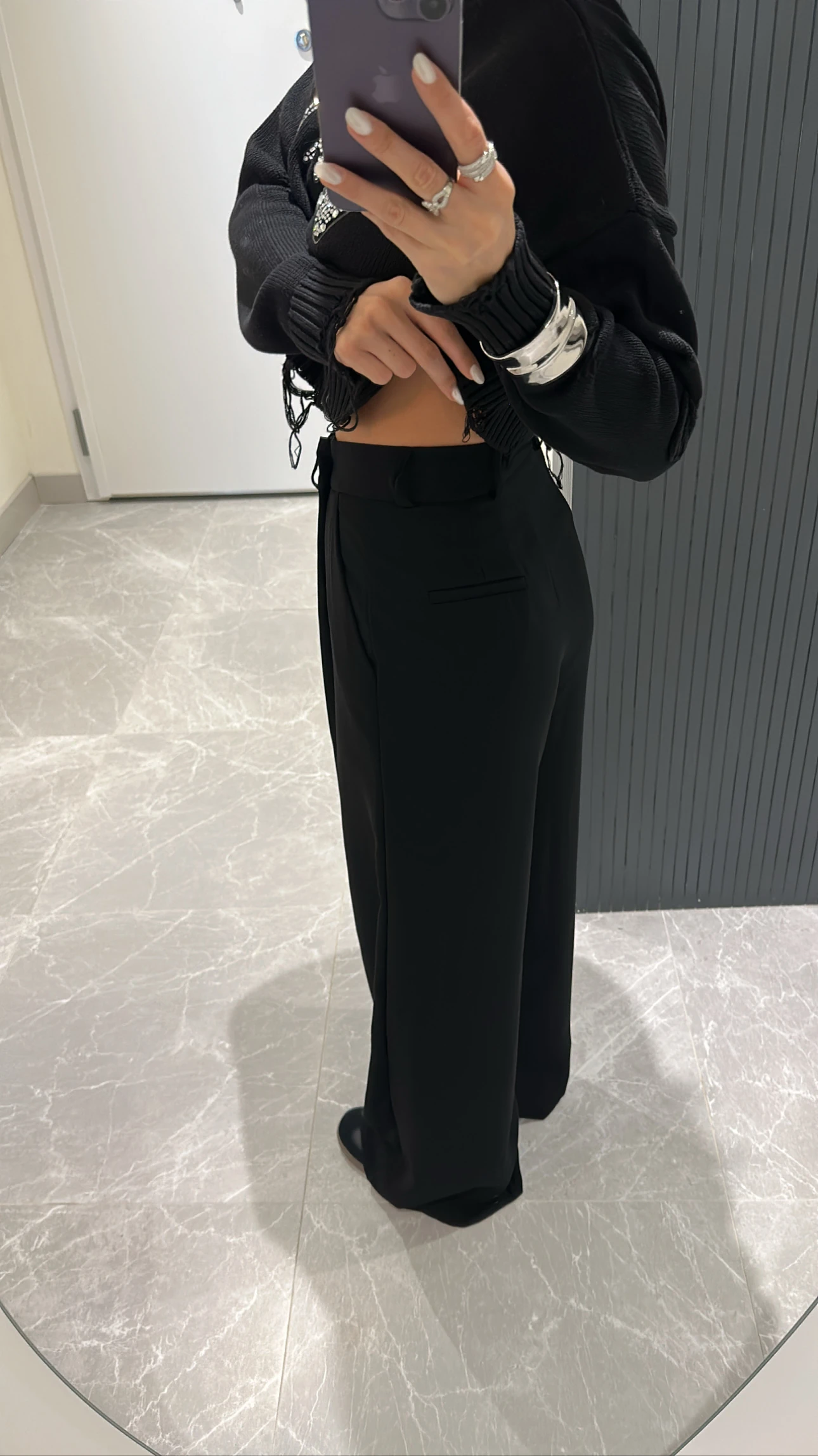 Marka model beli pille detaylı siyah pallazo pantolon