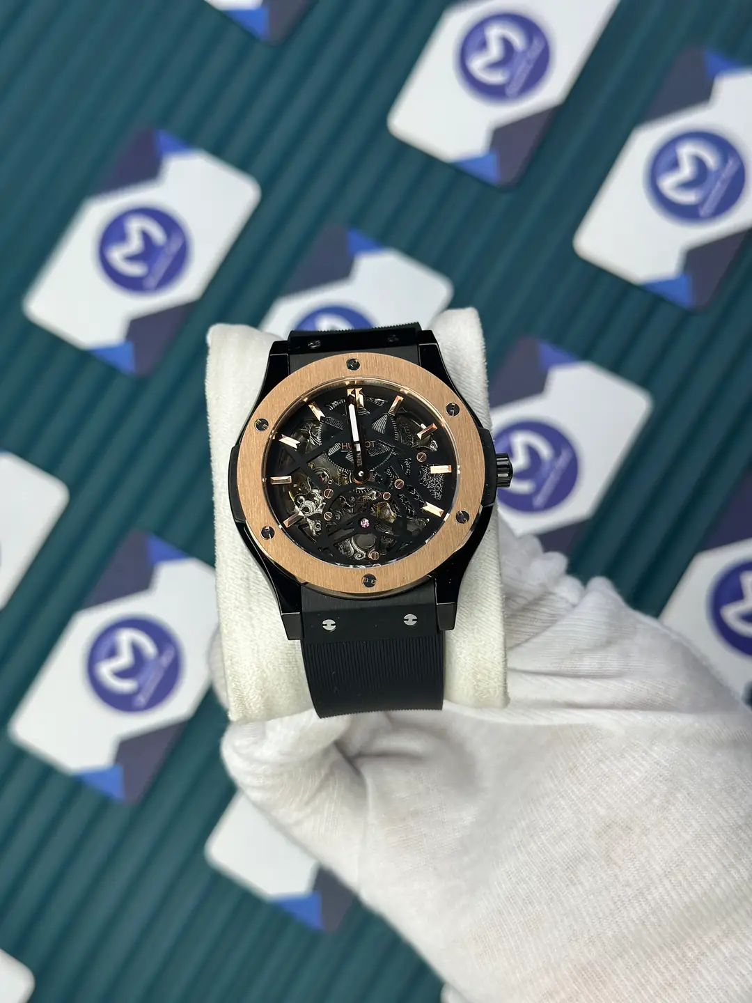 HUBLOT AUTOMATIC SKELETON DIAL ROSE BEZEL BLACK CASE BLACK RUBBER