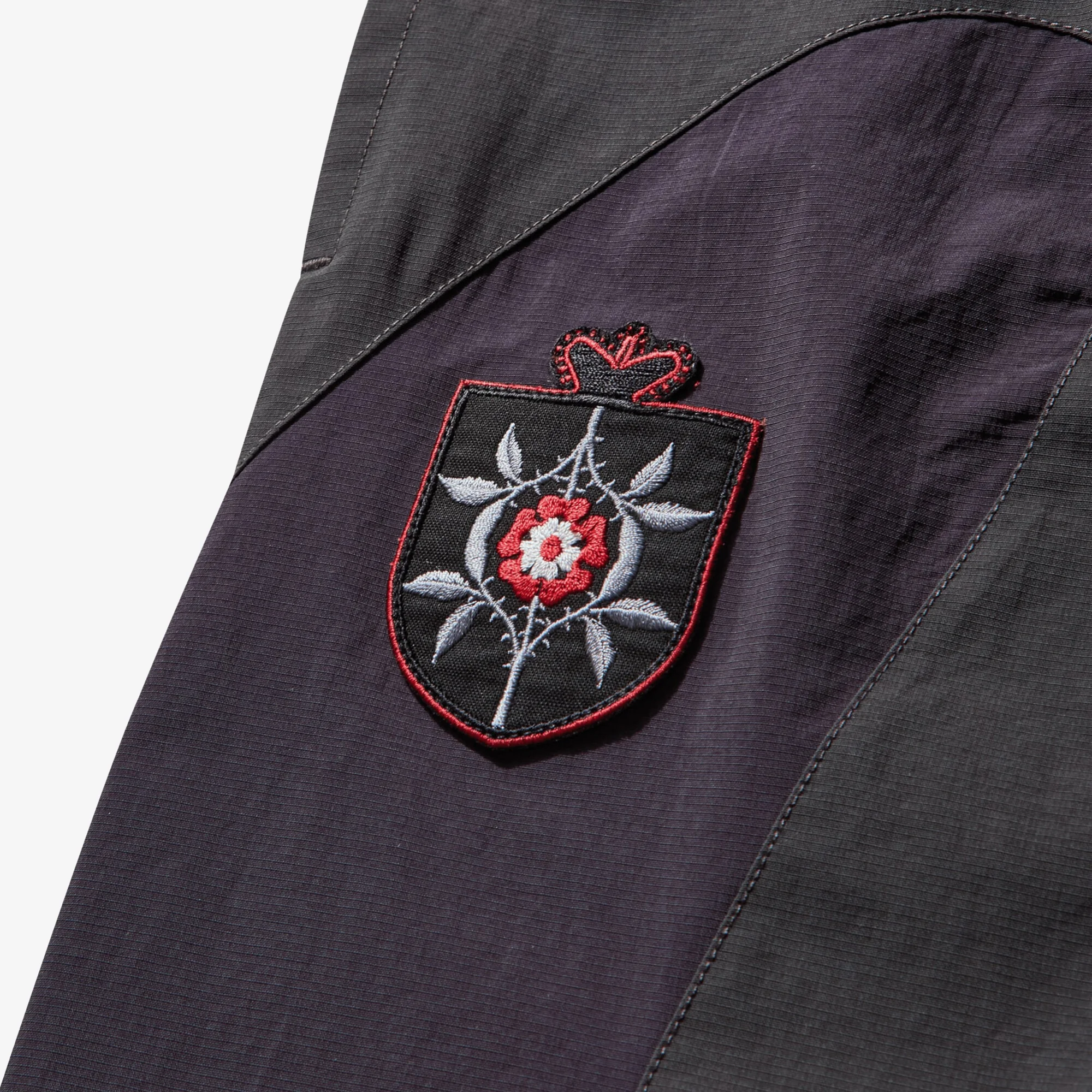 UMBRO Rose Crest Track Pants 'Dark Grey Dark Purple' - WUNDER